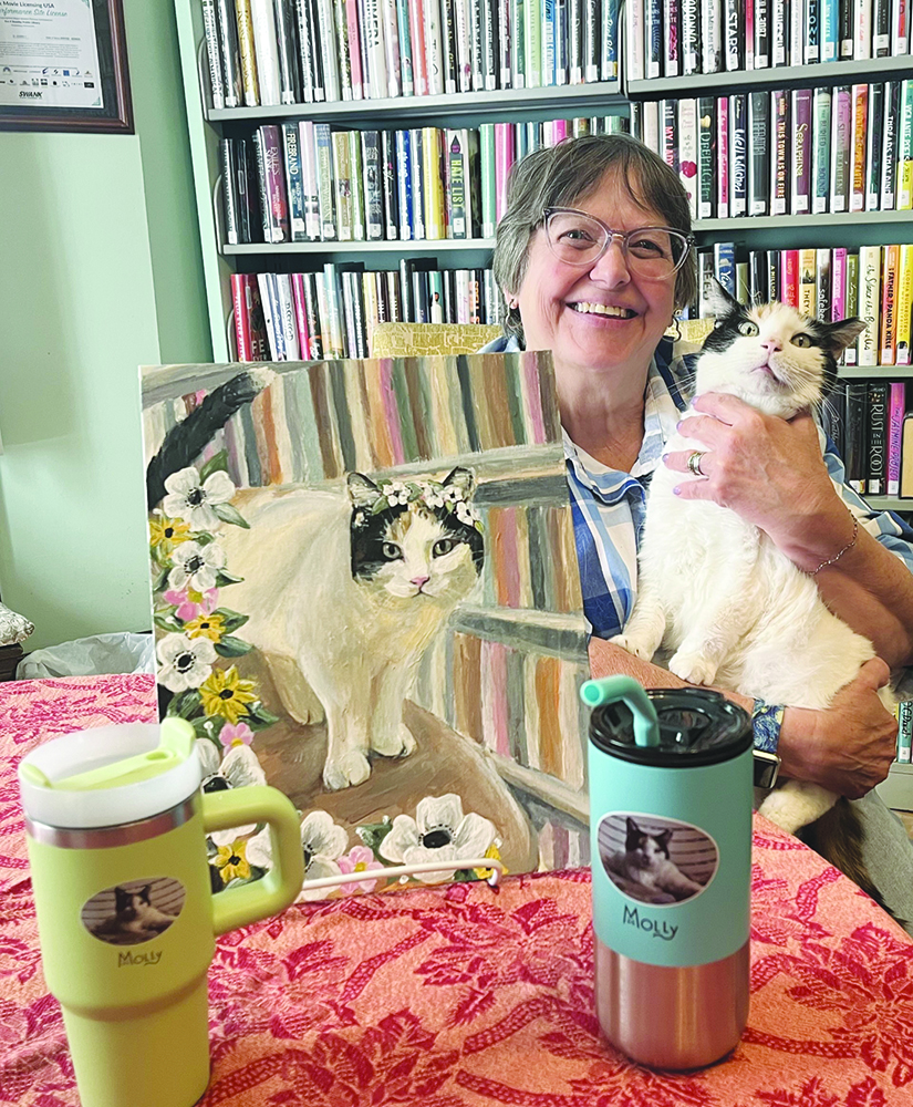 Purr-suing Knowledge at Bowlby Library - GreeneScene Magazine